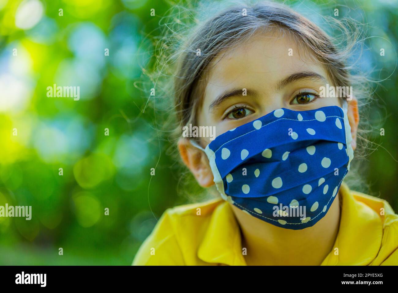 Little girl with mask Stock Photo - Alamy