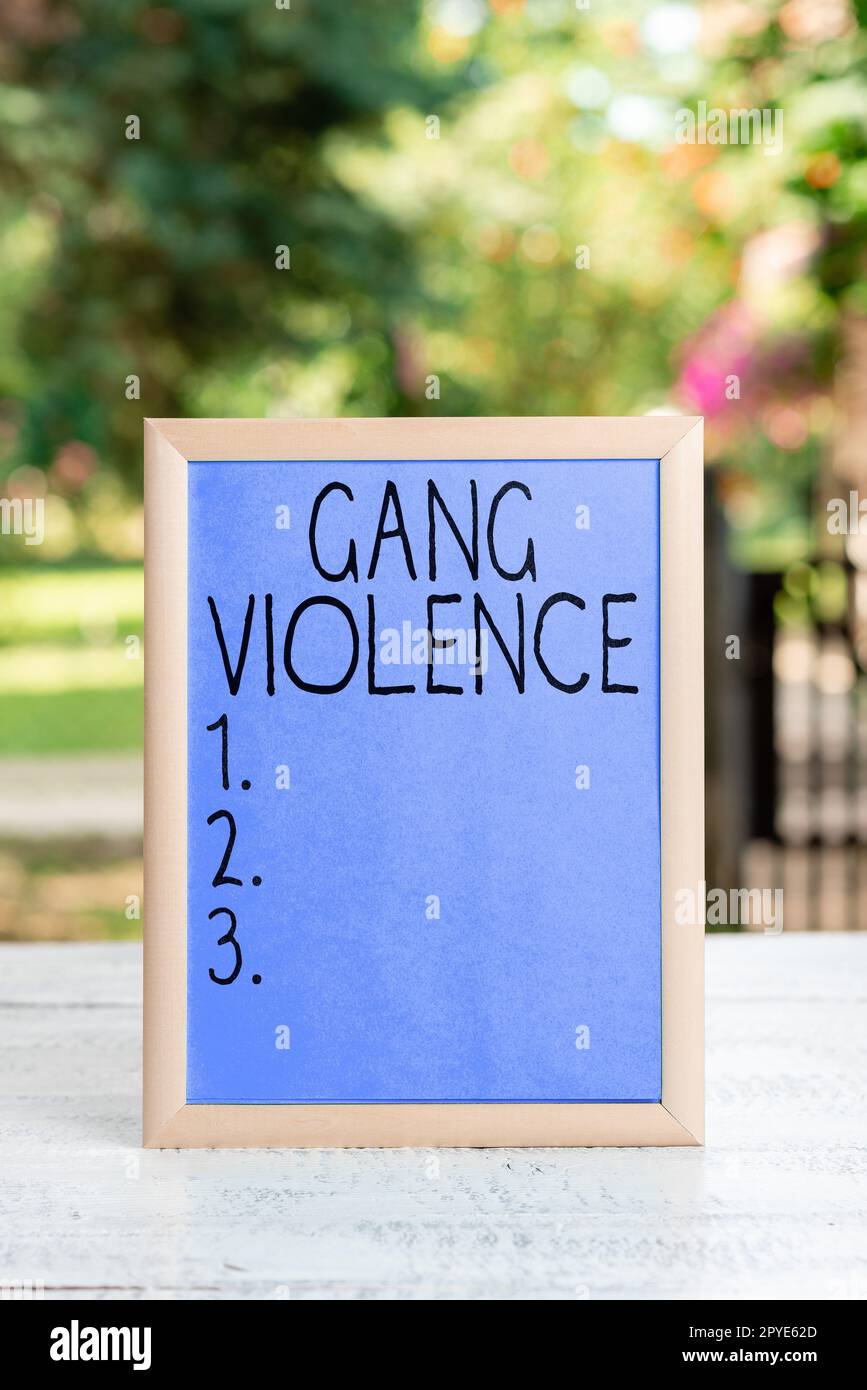 Handwriting text Gang Violence. Concept meaning infringement of the ...