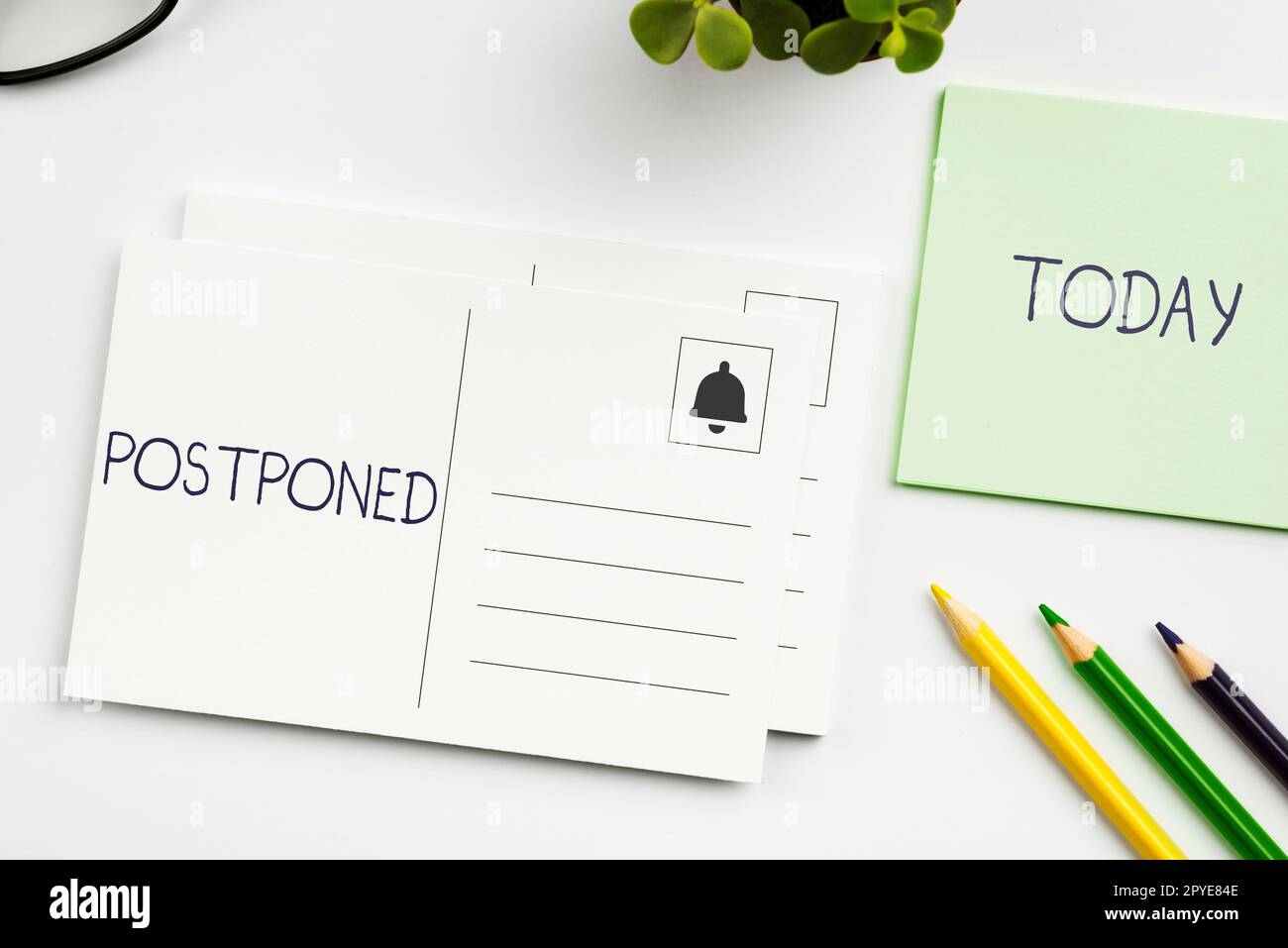 Hand writing sign Postponed. Business concept to place later in order ...
