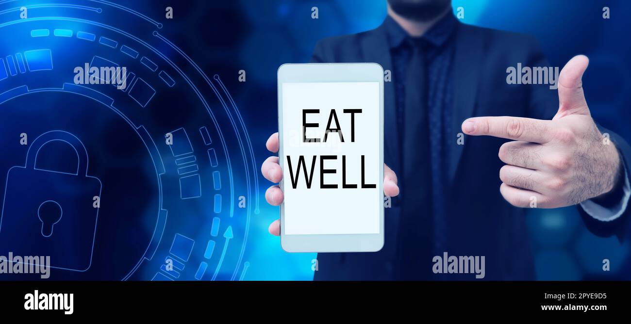 Hand writing sign Eat Well. Internet Concept Practice of eating only ...