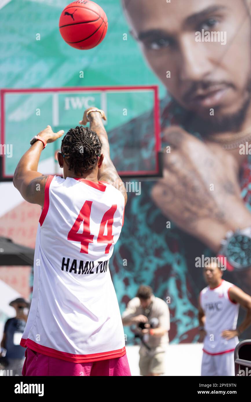 F1 car driver Lewis Hamilton attends a celebrity basketball tournament ...