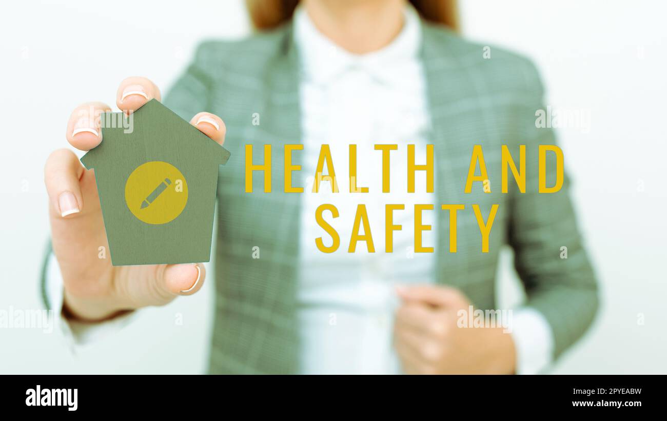 Sign displaying Health And Safety. Business overview Taking the ...