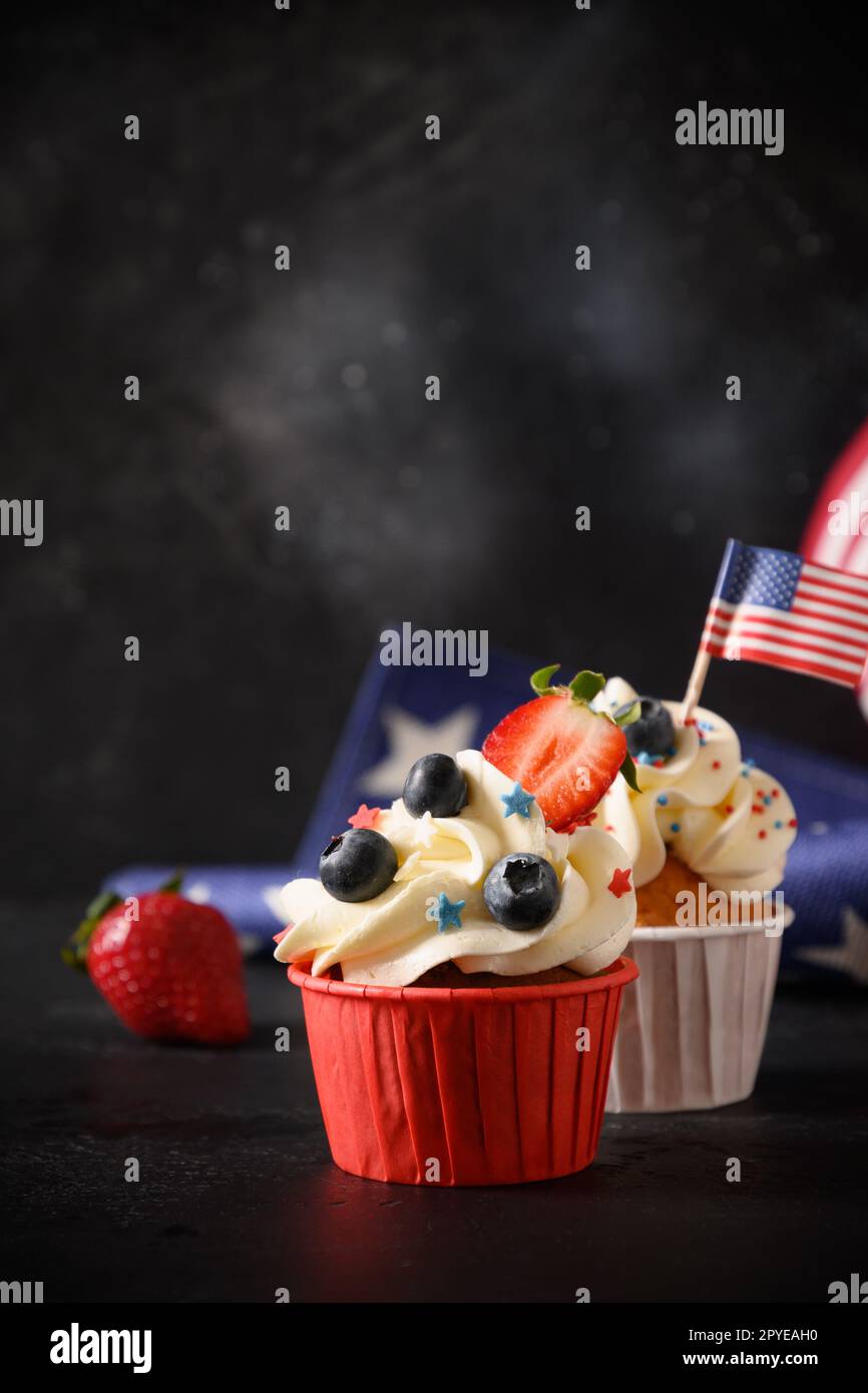 Patriotic American vanilla sweet cupcake decorated strawberry and ...