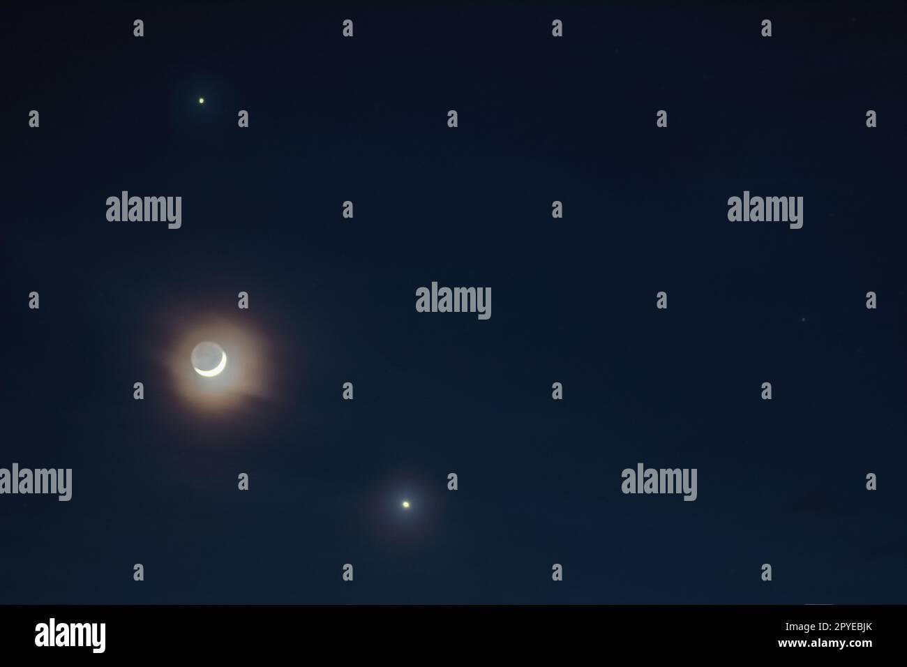 moon with a colored glow and two stars next to it Stock Photo - Alamy