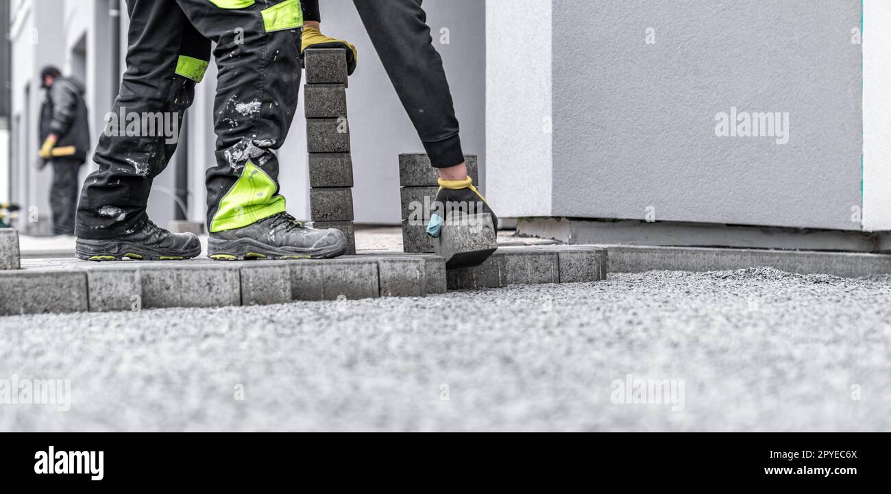 new sidewalk made of concrete interlocking paving blocks Stock Photo - Alamy