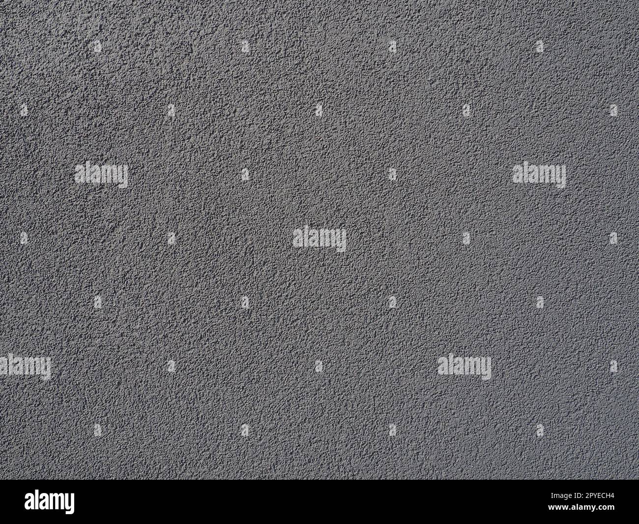 Gray background. Neatly plastered gray or black wall. Rough texture ...