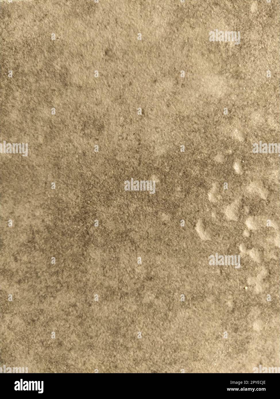 The textured surface of a concrete wall, marble or light stone with ...