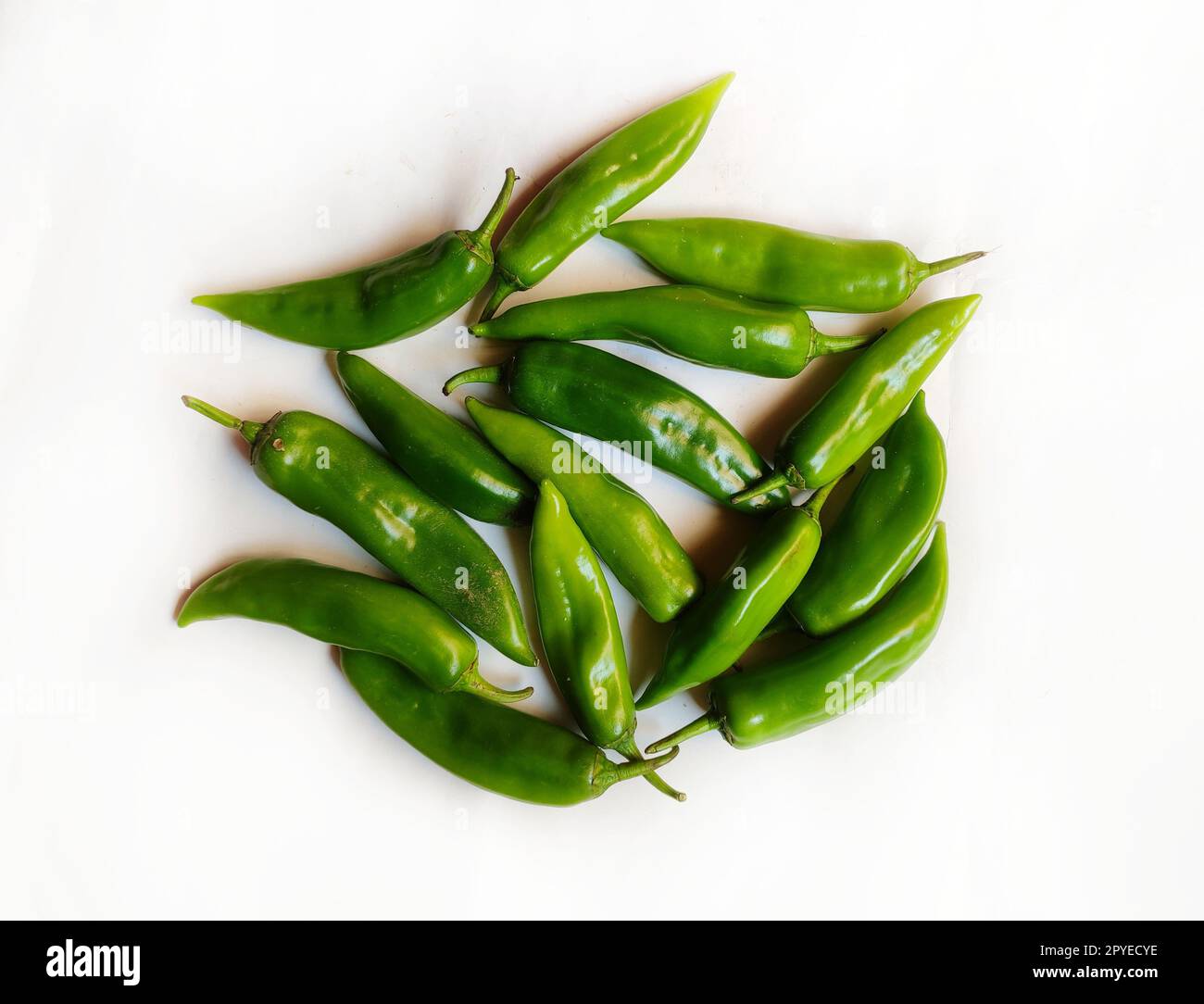 Green long capsicum in isolated white background Stock Photo - Alamy