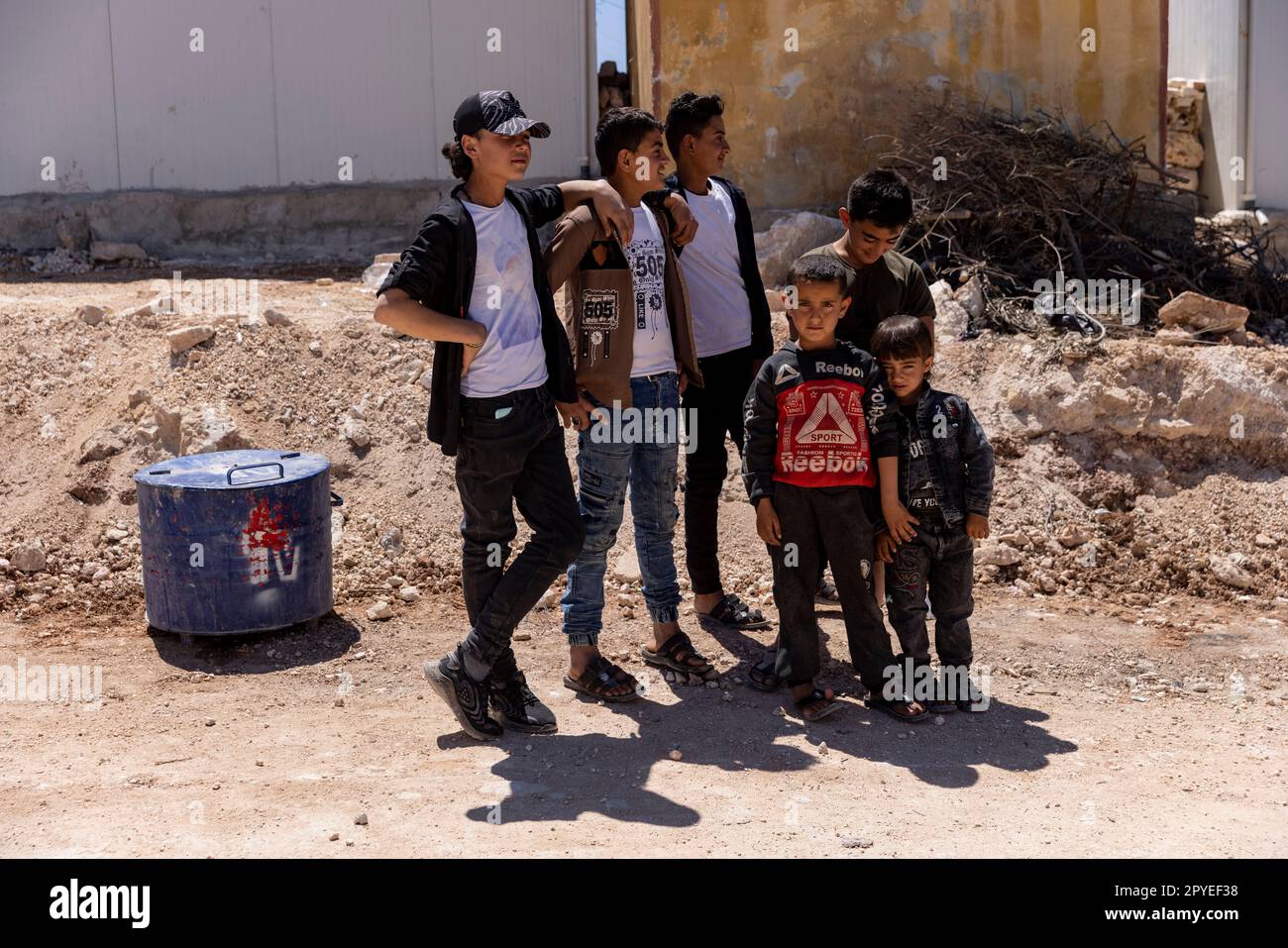 Salqin, Syria. 03rd May, 2023. Children stand in the middle of Al-Ajami ...