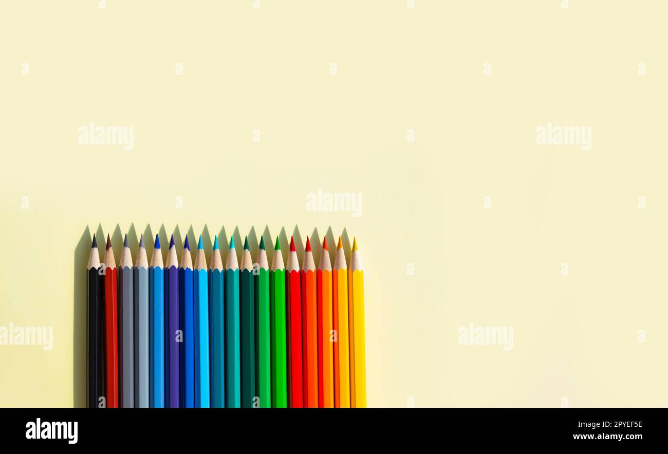 Numerous, bright pencils for drawing in an album in drawing classes ...
