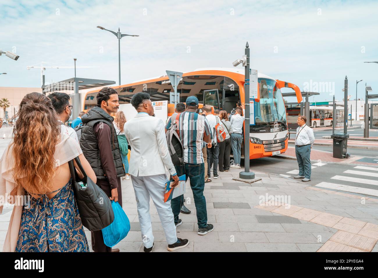 14 January 2023, Dubai, UAE: Queue line to intercity bus to Abu Dhabi ...