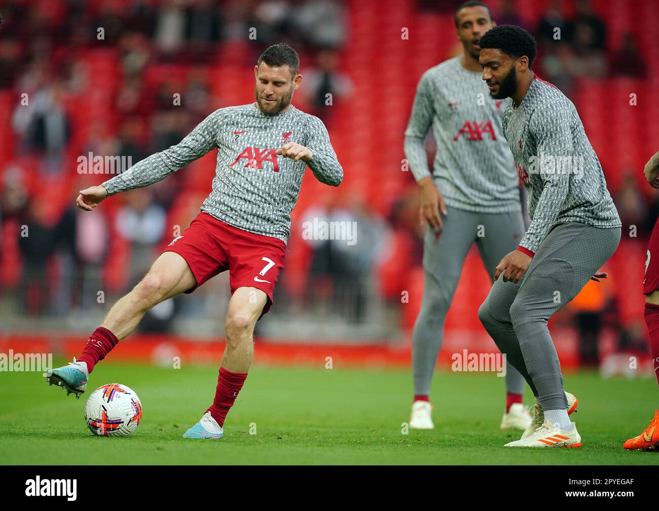 Liverpool's James Milner warms up before the Premier League match at ...