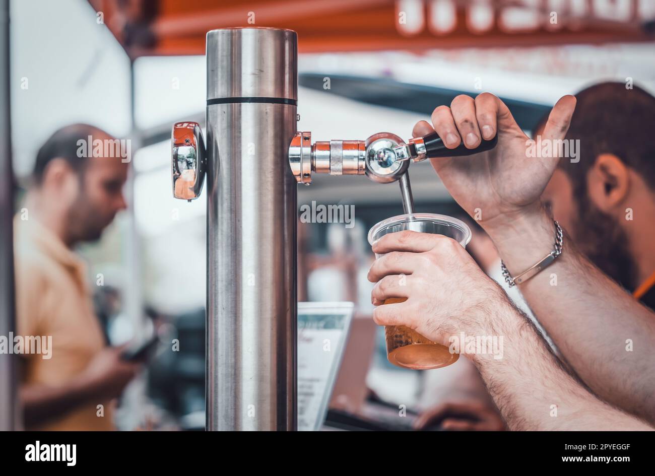 Hands bartender pouring beer glass hi-res stock photography and images ...