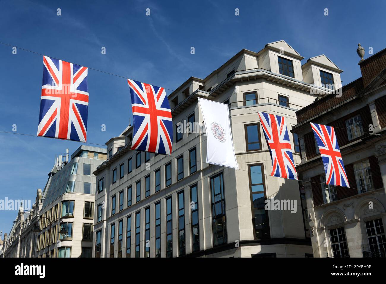 A row of flag over the Strand in London, British flag Union jack and ...