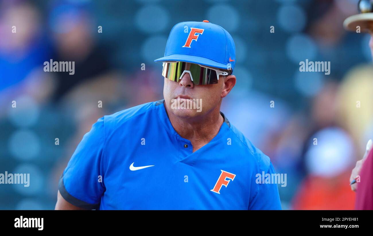 Florida head coach Kevin O'Sullivan greets officials during an NCAA ...
