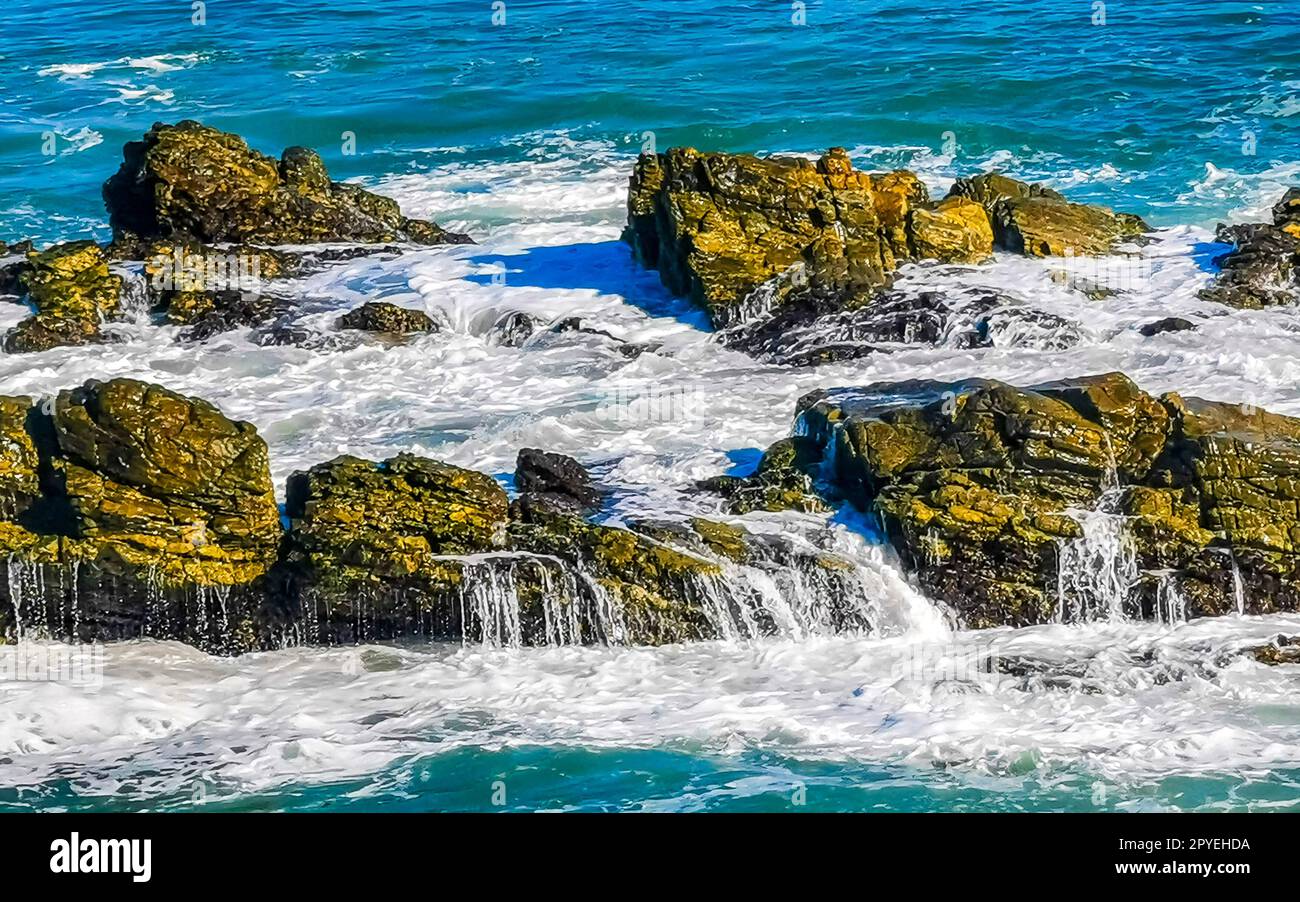 Beautiful rocks cliffs surfer waves at beach Puerto Escondido Mexico ...