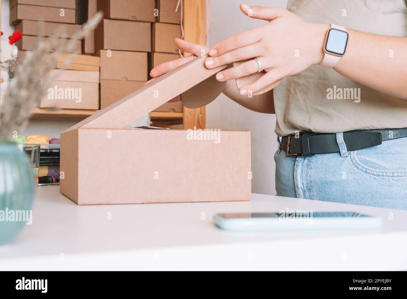 Cropped photo woman wrapping hi-res stock photography and images - Alamy