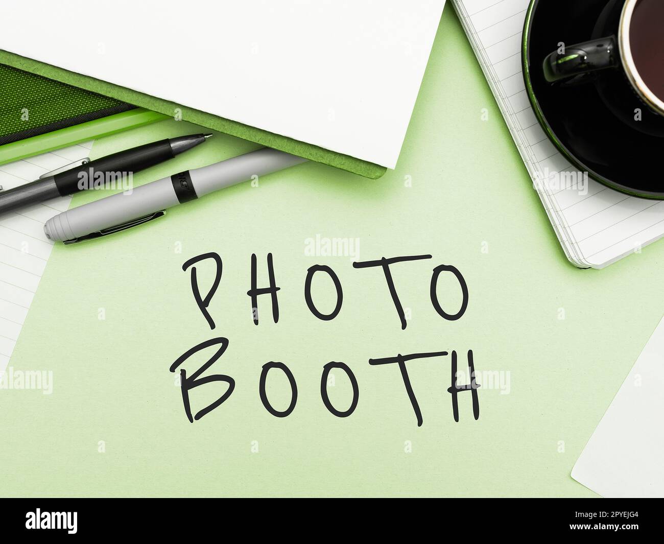 Hand writing sign Photo Booth. Business concept form of photo sharing ...
