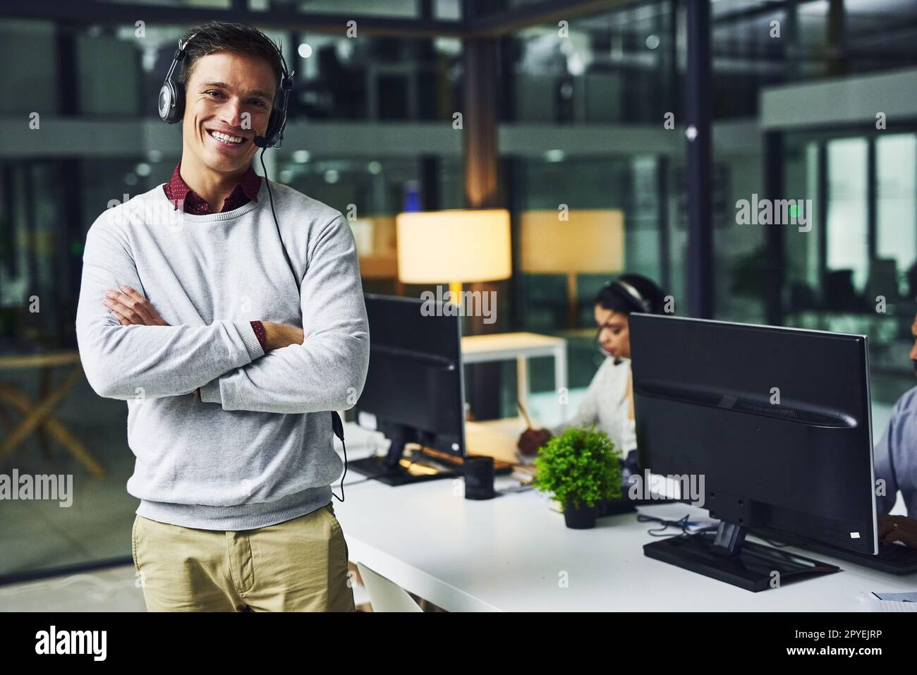 We aim to give great customer care to all. Portrait of a young call ...