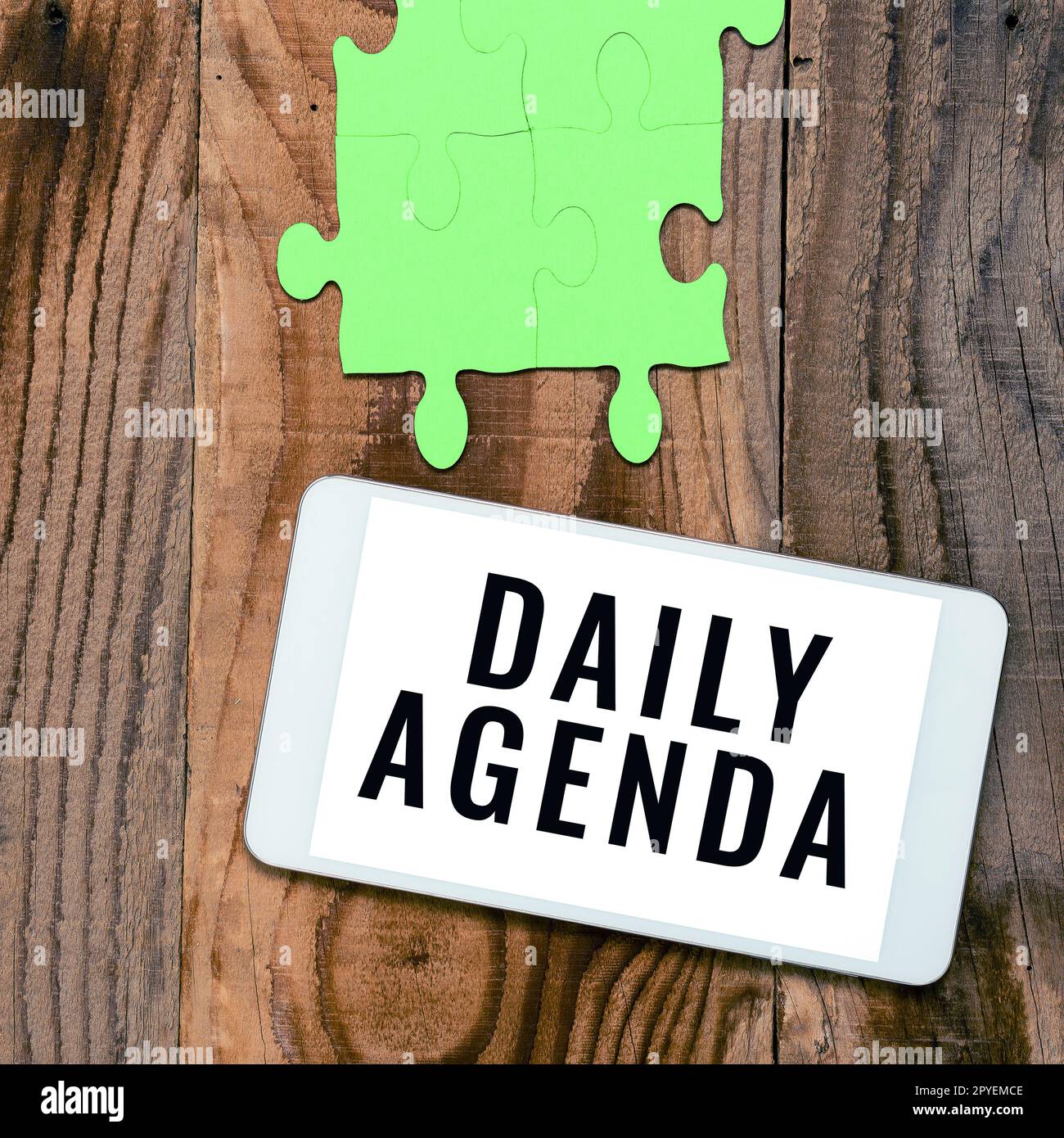 Hand writing sign Daily Agenda. Internet Concept To do list of items be ...