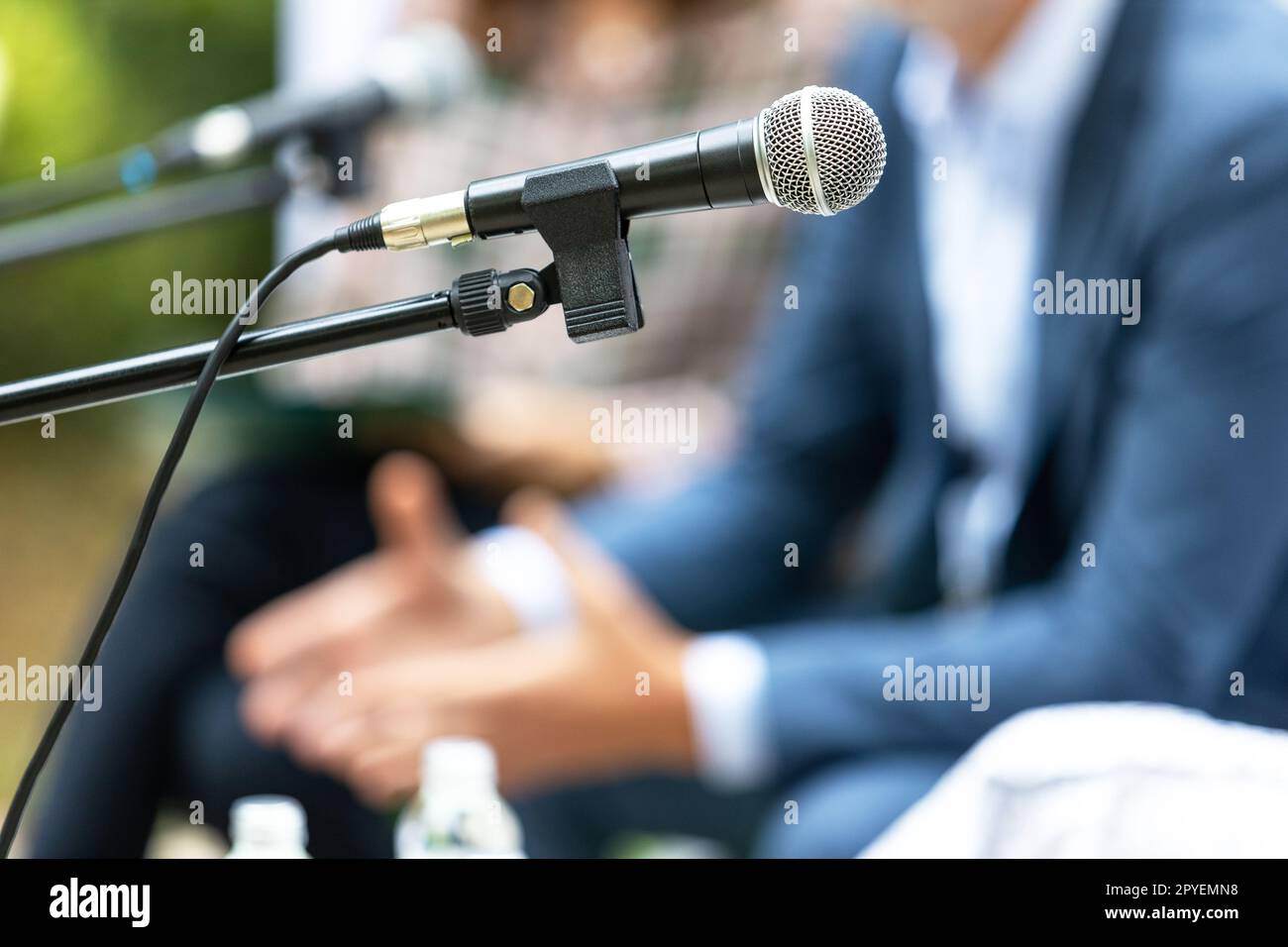 Microphone in focus at round table event or business conference Stock ...