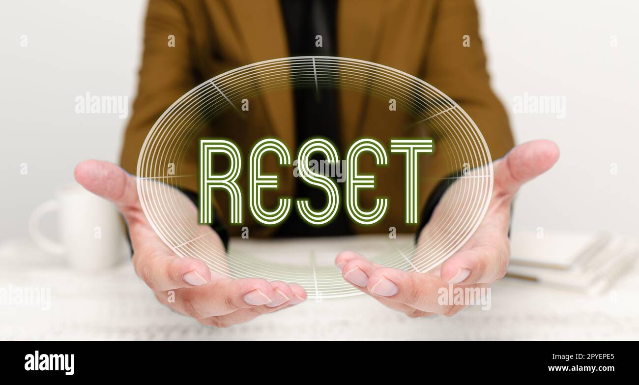 Text sign showing Reset. Concept meaning cause device return to its ...