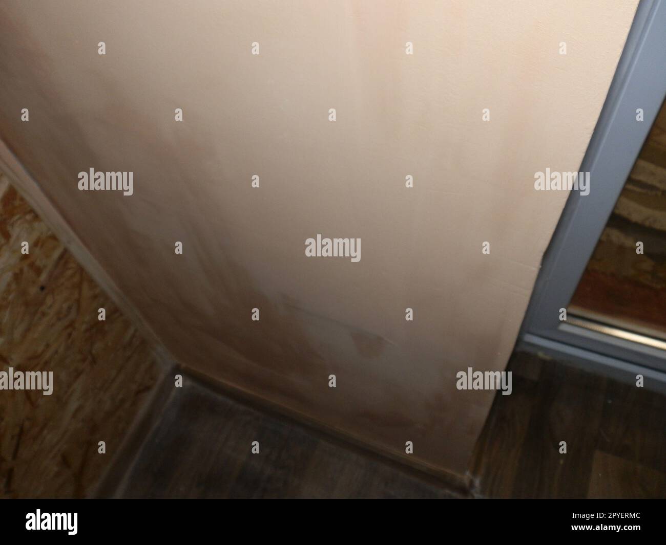 Painting interior acrylic paint walls during renovation Stock Photo - Alamy