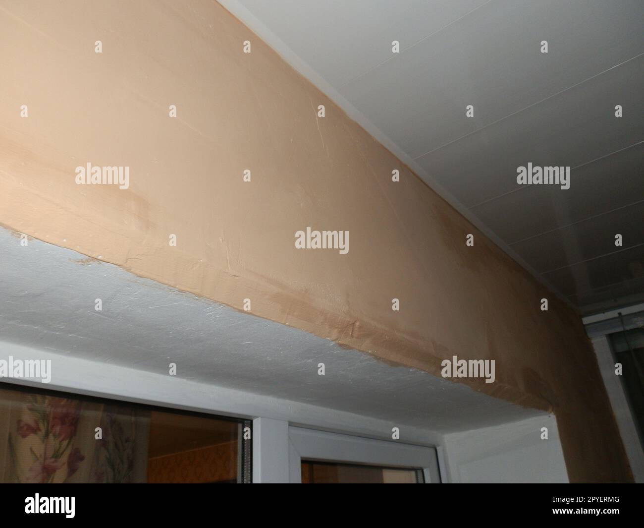 Painting interior acrylic paint walls during renovation Stock Photo - Alamy