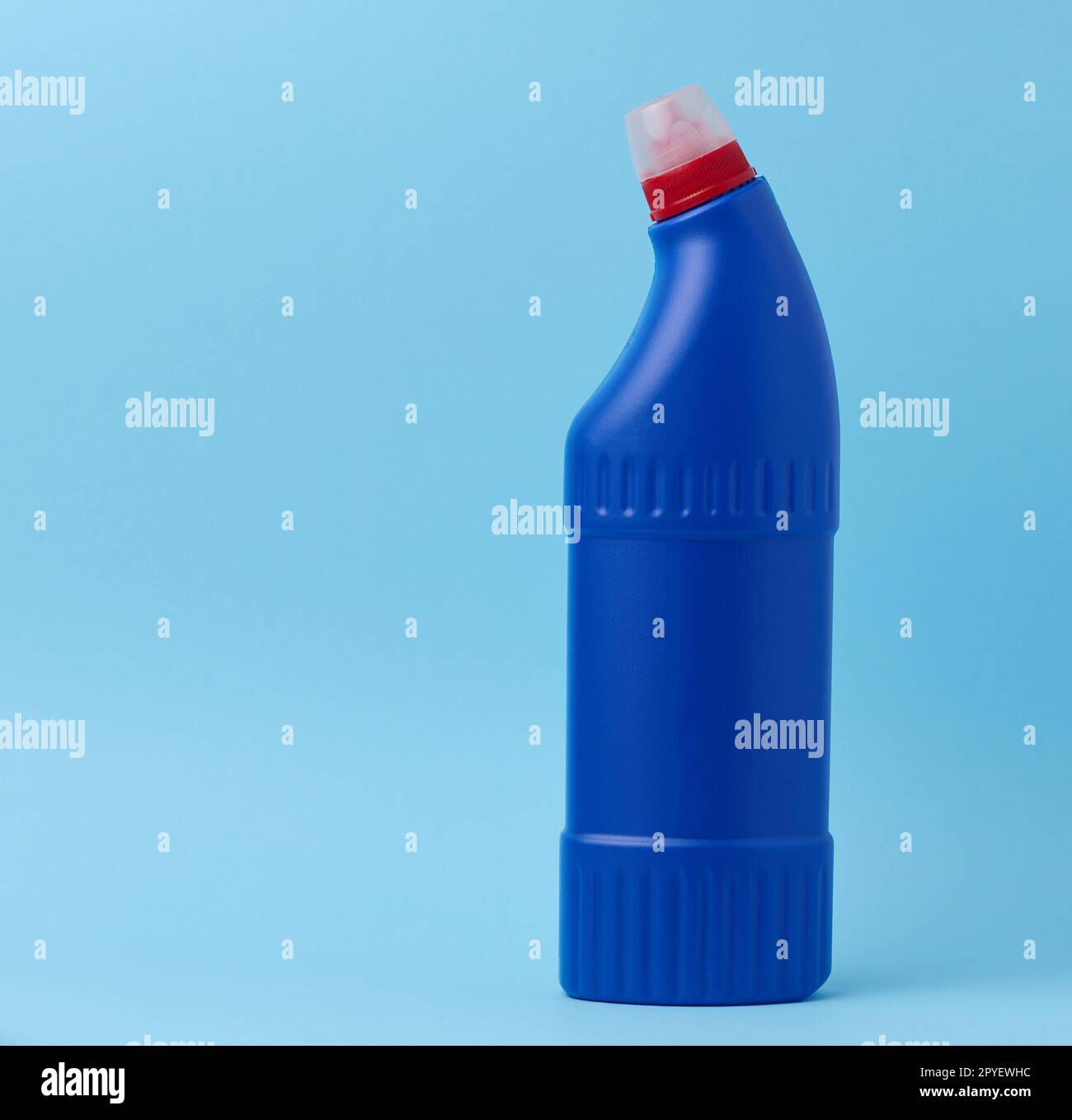 Blue plastic bottle for chemical detergents on a blue background Stock ...