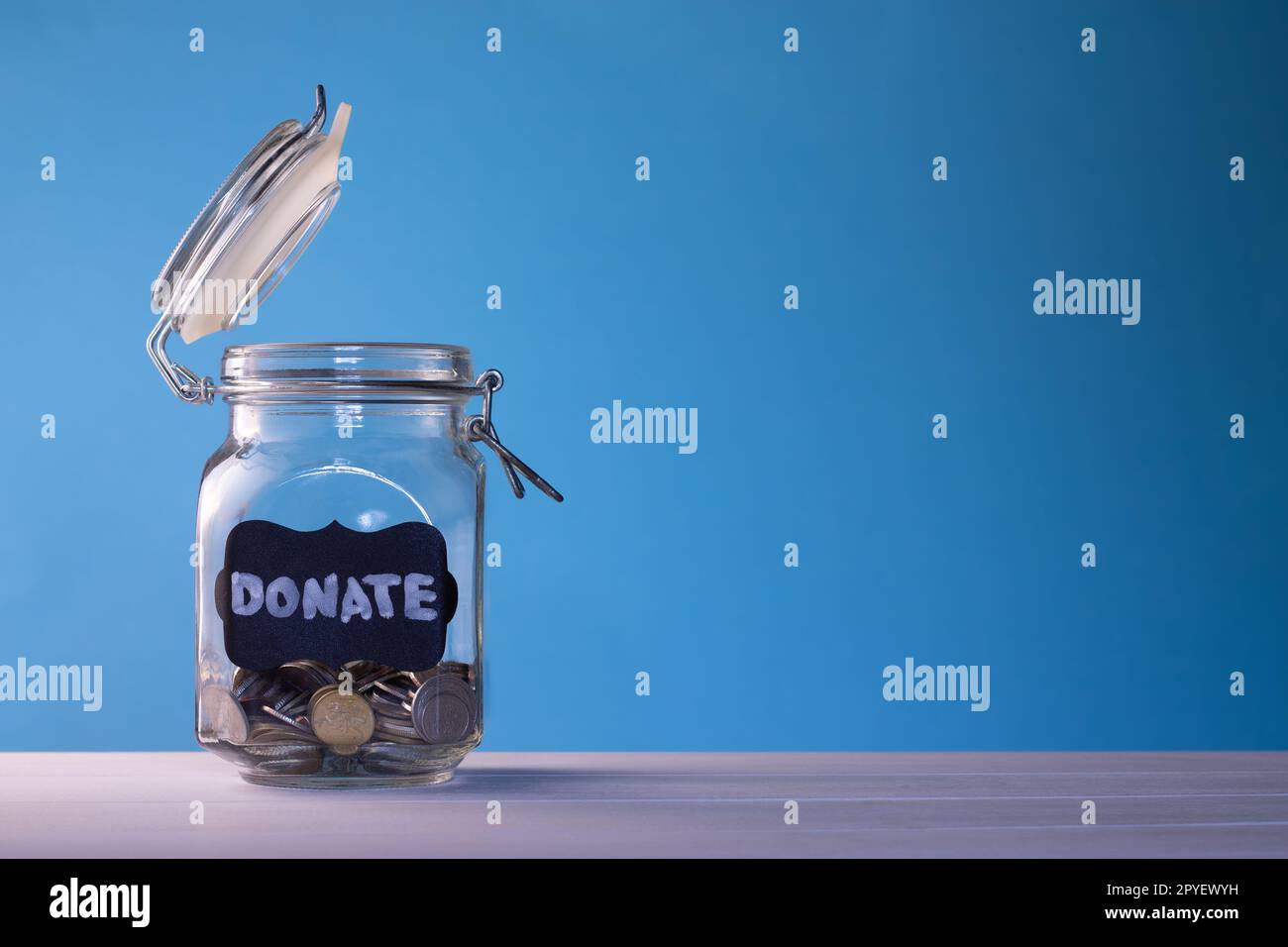 Donation jar hi-res stock photography and images - Alamy