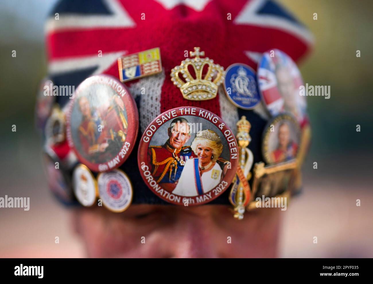 A man shows his royal support as people line up, Wednesday, May 3, 2023 ...