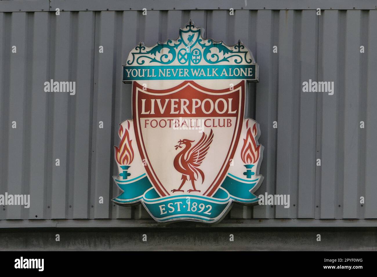 The Liverpool badge lit up at Anfield during the Premier League match ...