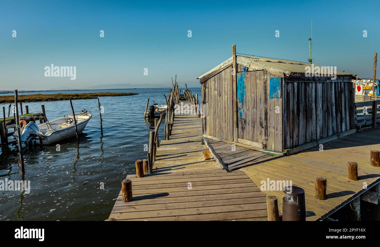 Wooden walkways and huts of the Cais de Palafitas da Carrasqueira ...
