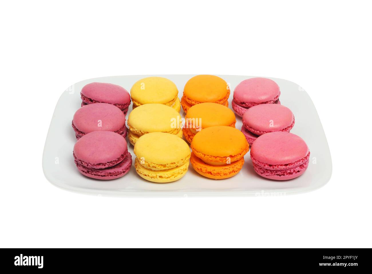 Selection of macarons on a plate isolated against white Stock Photo - Alamy