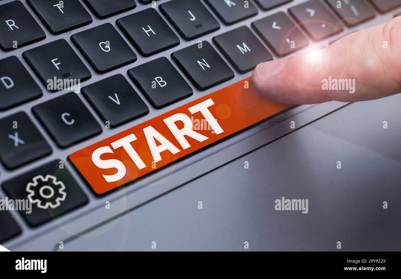Hand writing sign Start. Word Written on begin or be reckoned from ...