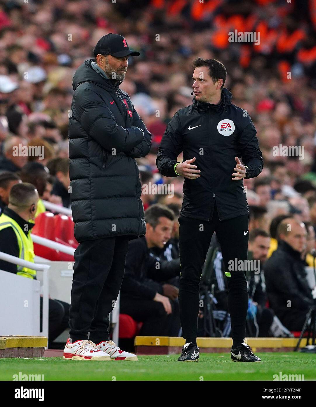 Liverpool manager Jurgen Klopp with the fourth official Tony Harrington ...