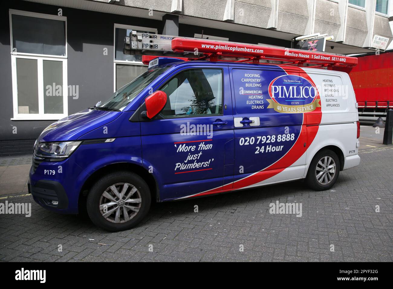 Pimlico plumbers van parked on a road in London Stock Photo - Alamy