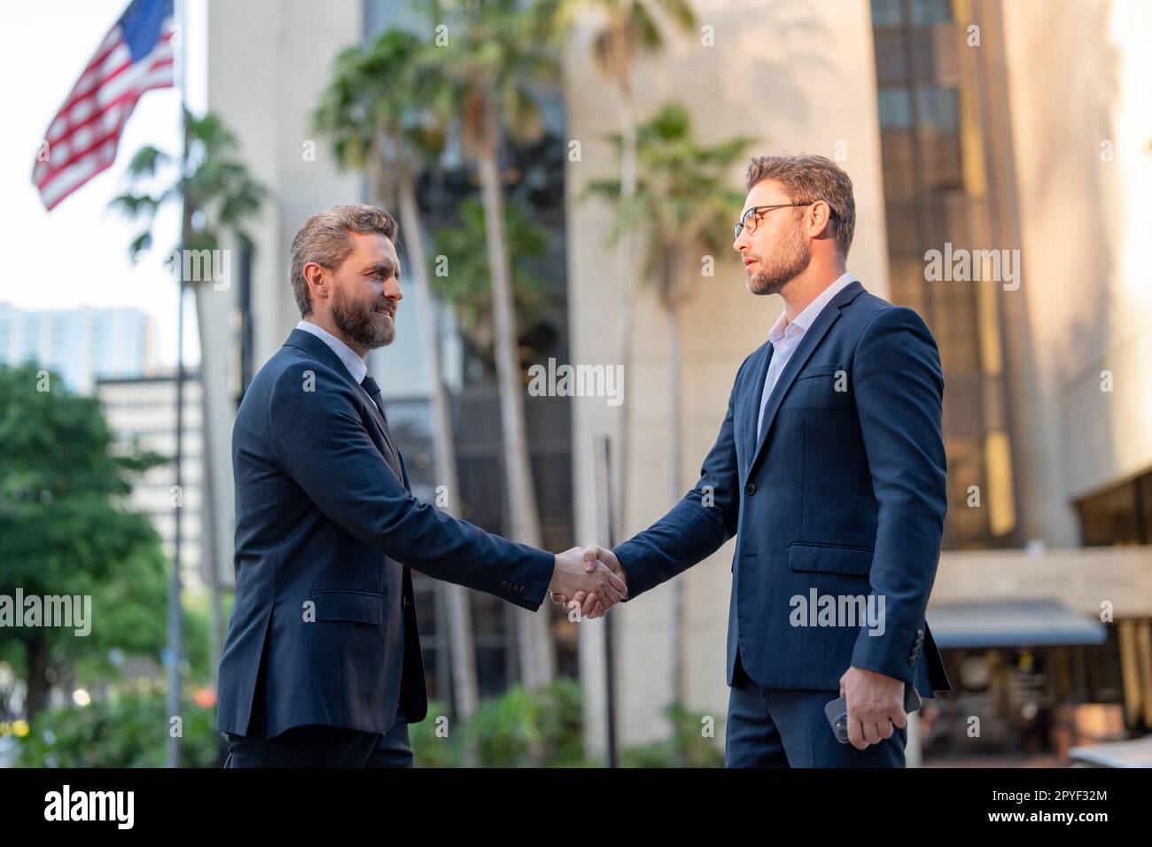The two business teams leadership. Business man shaking hands. Two ...