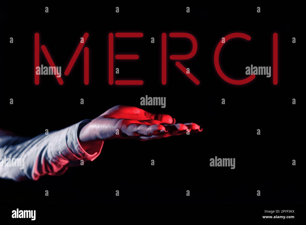 Text sign showing Merci. Internet Concept what is said or response when ...