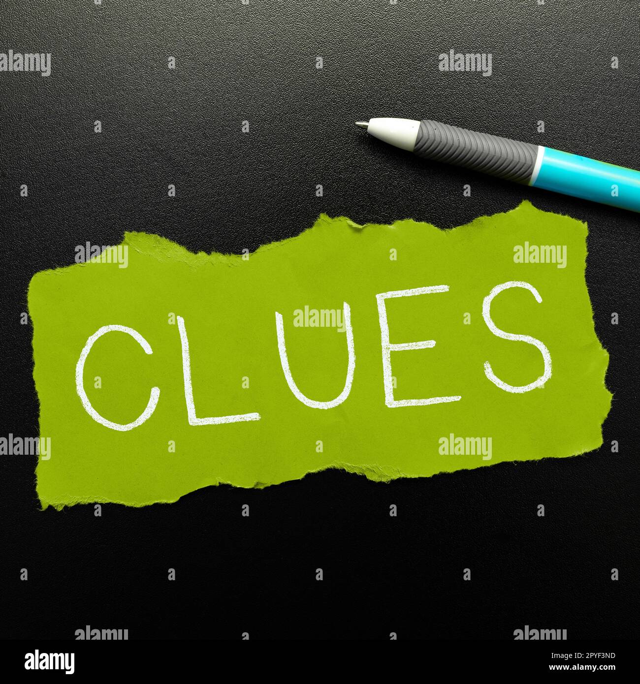 Hand writing sign Clues. Business overview Piece of evidence ...