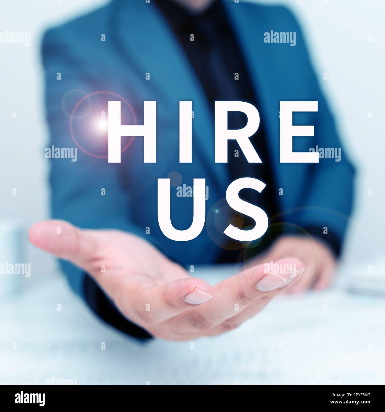 Sign displaying Hire Us. Business overview Used by human resources ...