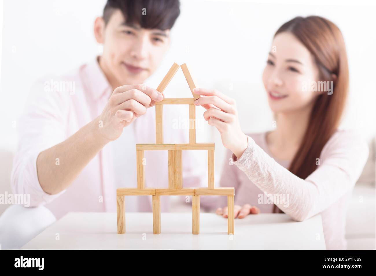 Happy young couple stack hi-res stock photography and images - Alamy