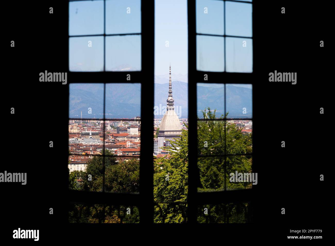 Turin - Italy - Urban skyline with Mole Antonelliana building, blue sky ...
