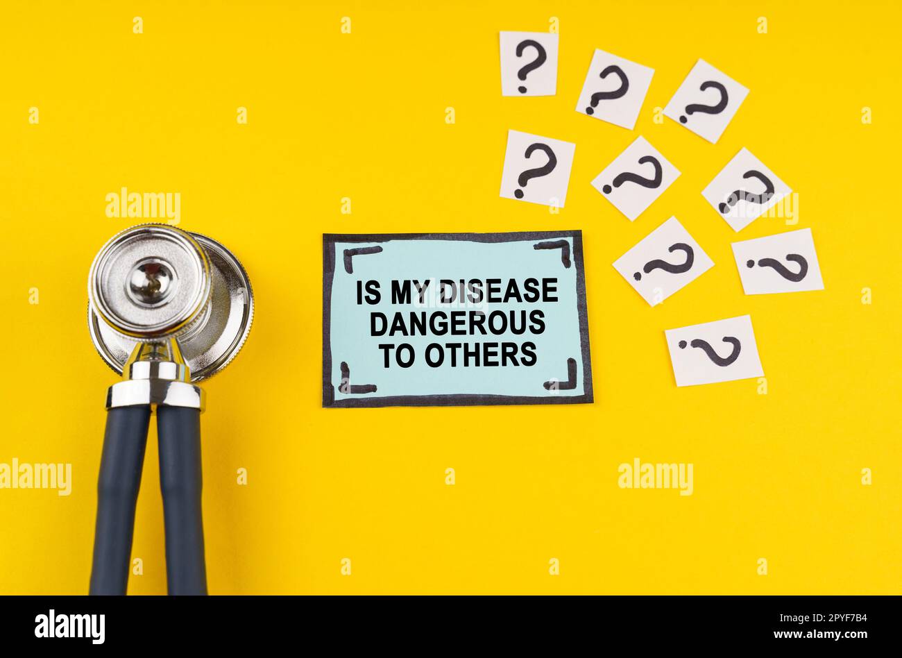 Medical concept. Question. On a yellow background a stethoscope ...