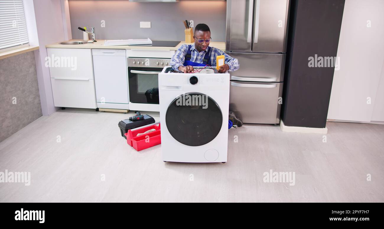 Washing Machine Appliance Repair And Install Stock Photo - Alamy