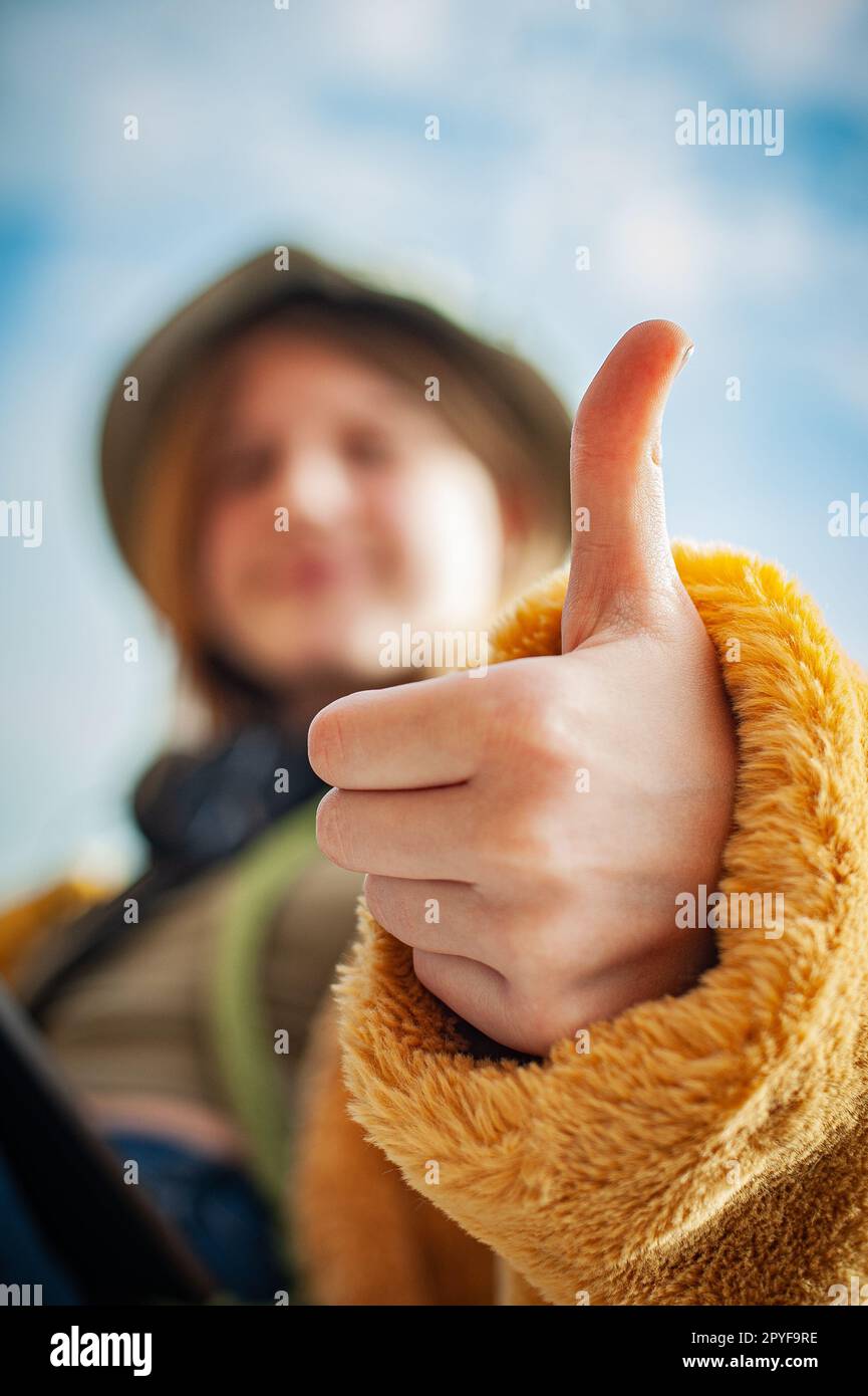Body Language, Thumb Up Gesture. Influencer girl gesturing success ...