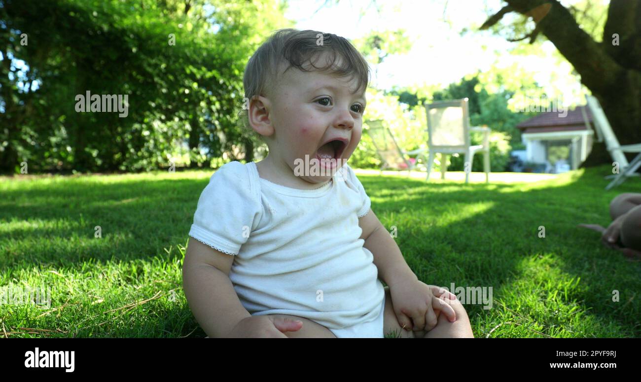upset baby outside open mouth having a tantrum Stock Photo - Alamy