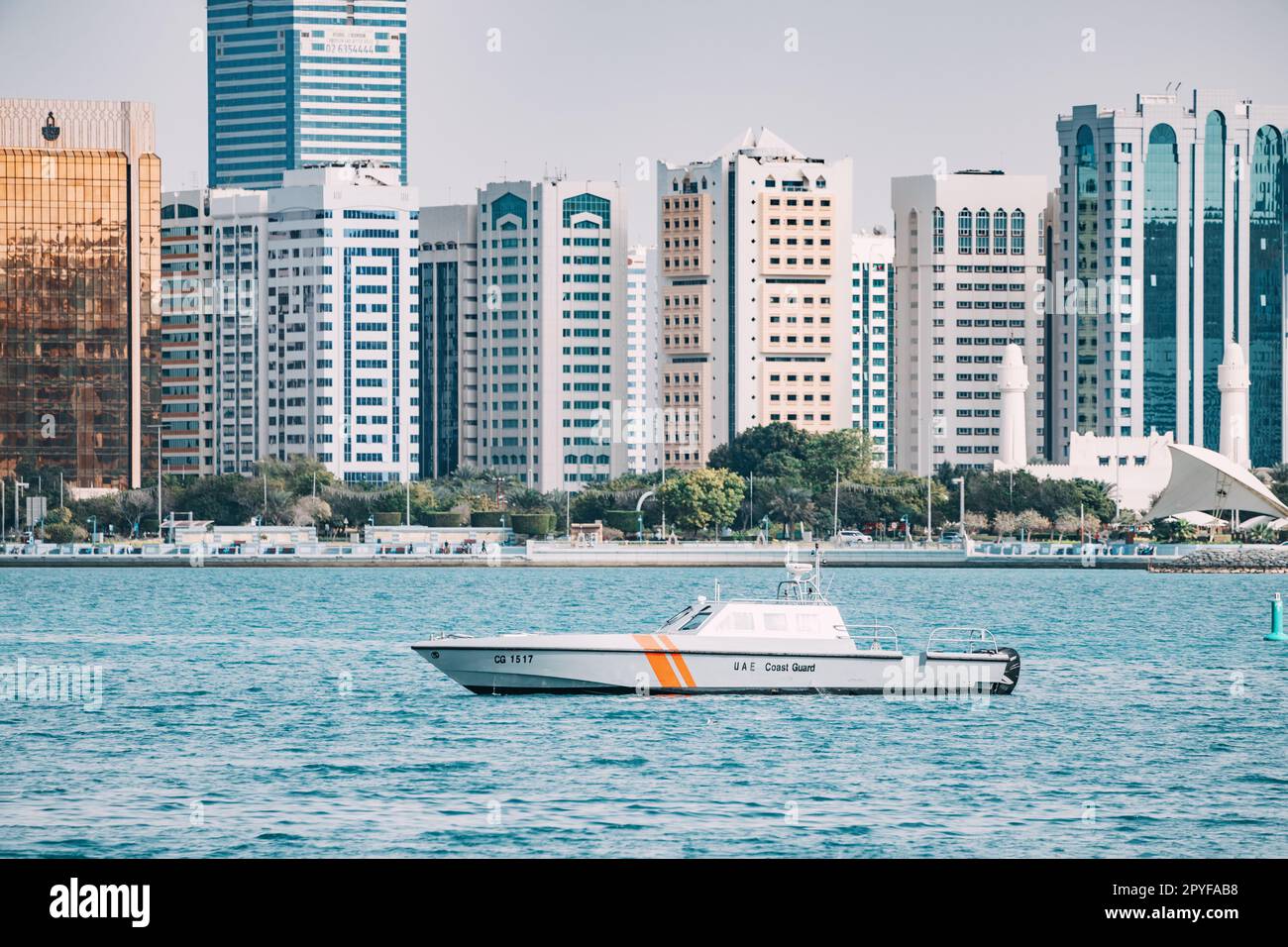 15 January 2023, Abu Dhabi, UAE: Costal guard ship near city downtown ...