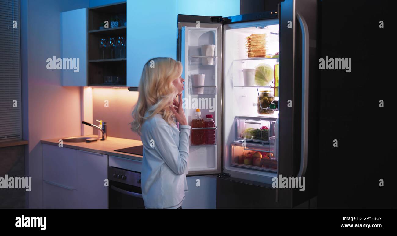 Looking inside fridge hi-res stock photography and images - Alamy