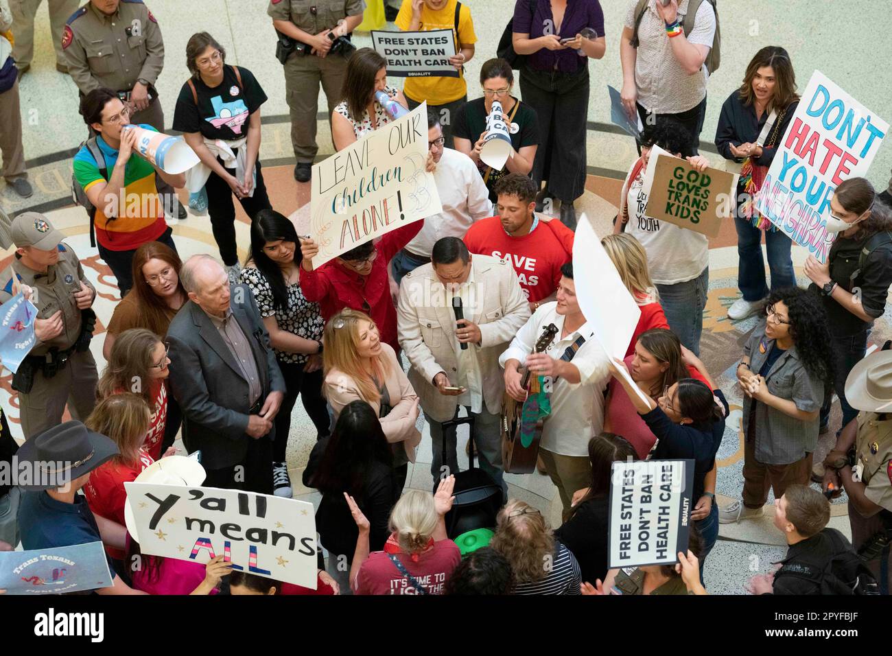 Austin, TX, USA. 2nd May, 2023. LGBTQ activists surround members of the ...